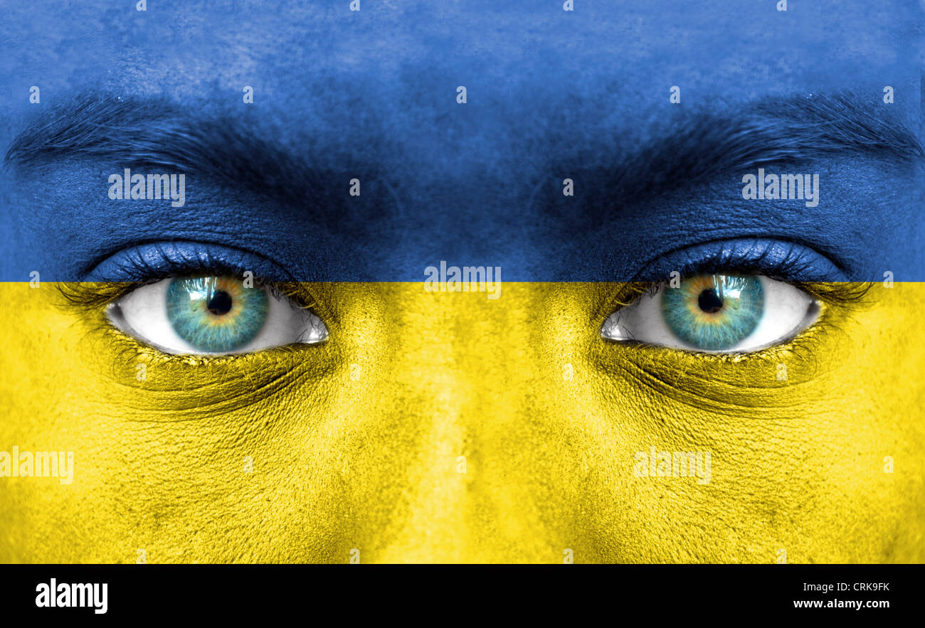 Human face painted with flag of Ukraine Stock Photo - Alamy