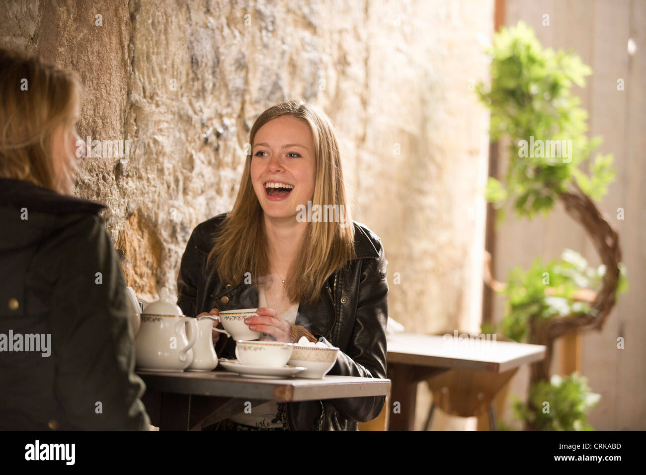 Glad woman having tea hi-res stock photography and images - Alamy