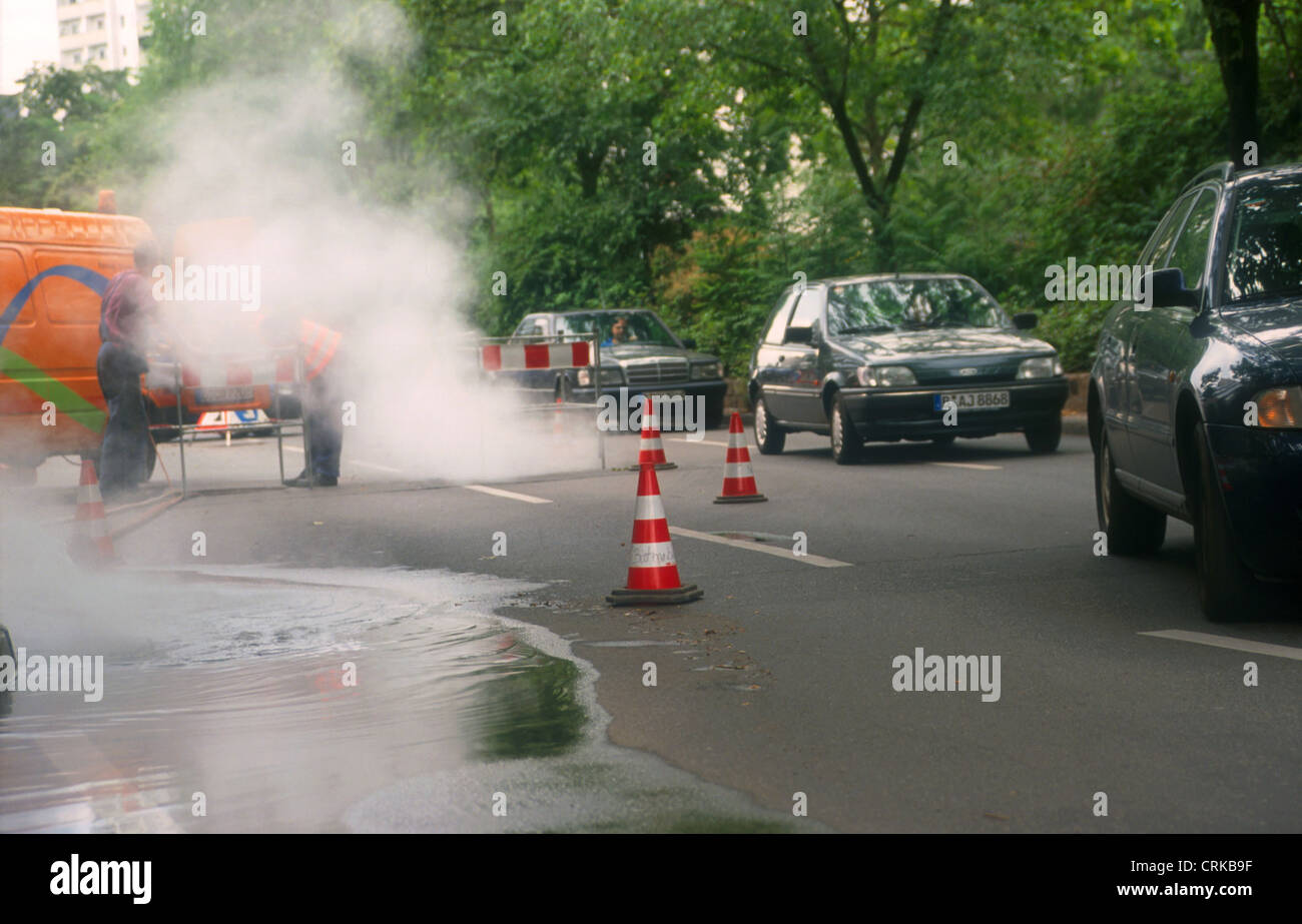 Road construction site with water and steam Bewag in Berlin Stock Photo ...