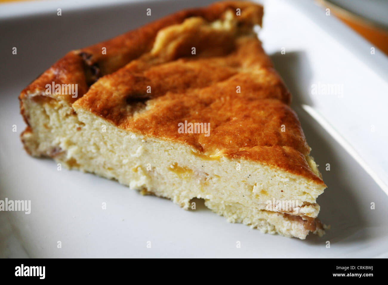 Delicious auburn baked cheesecake Stock Photo - Alamy
