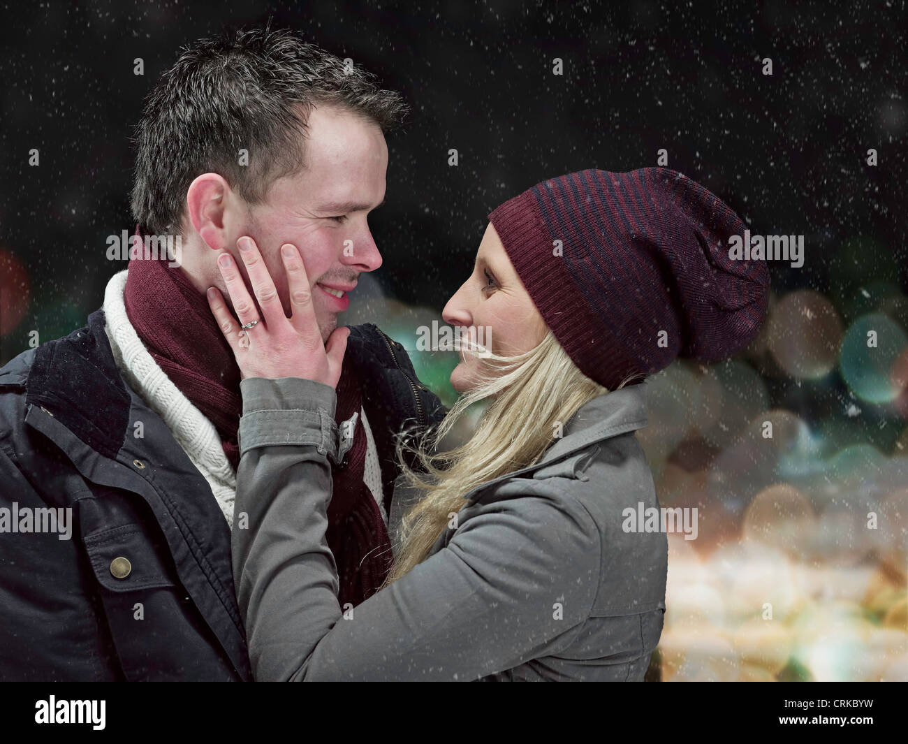 Couple hugging outdoors at night Stock Photo - Alamy