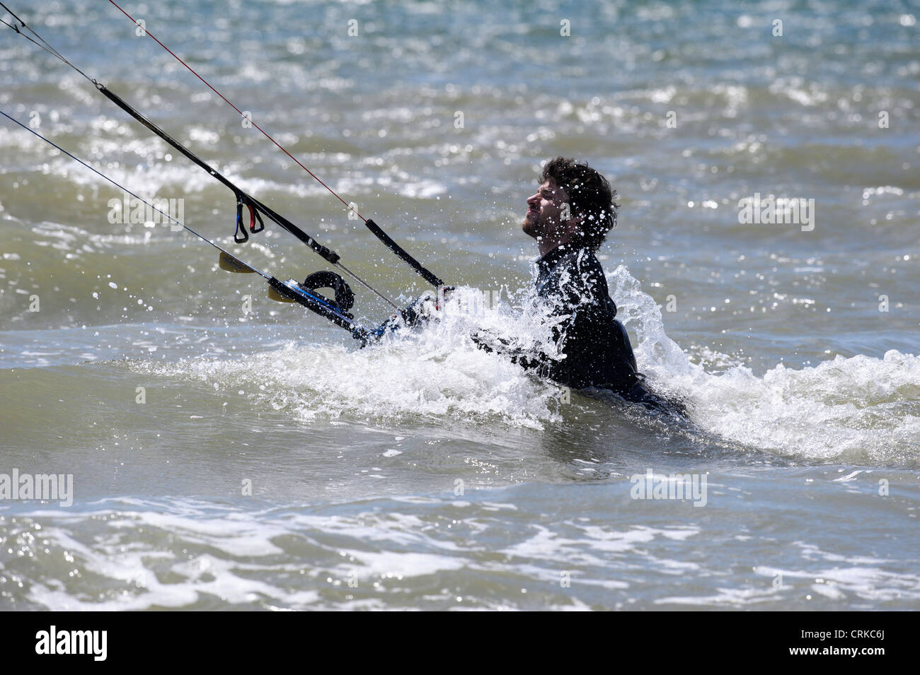 Using a power kite to drag / body surf through the water Stock Photo ...
