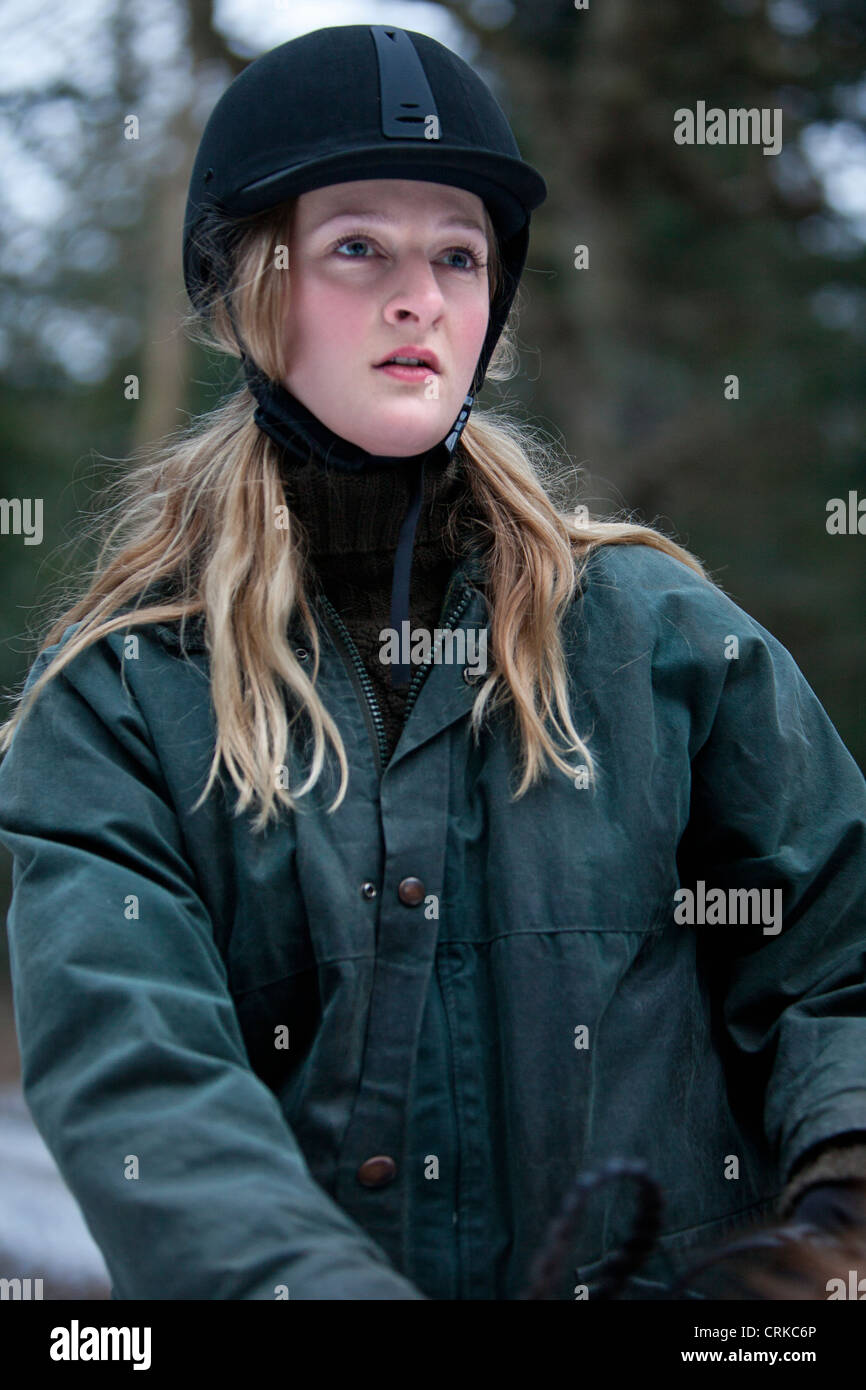 Woman riding horse outdoors Stock Photo - Alamy