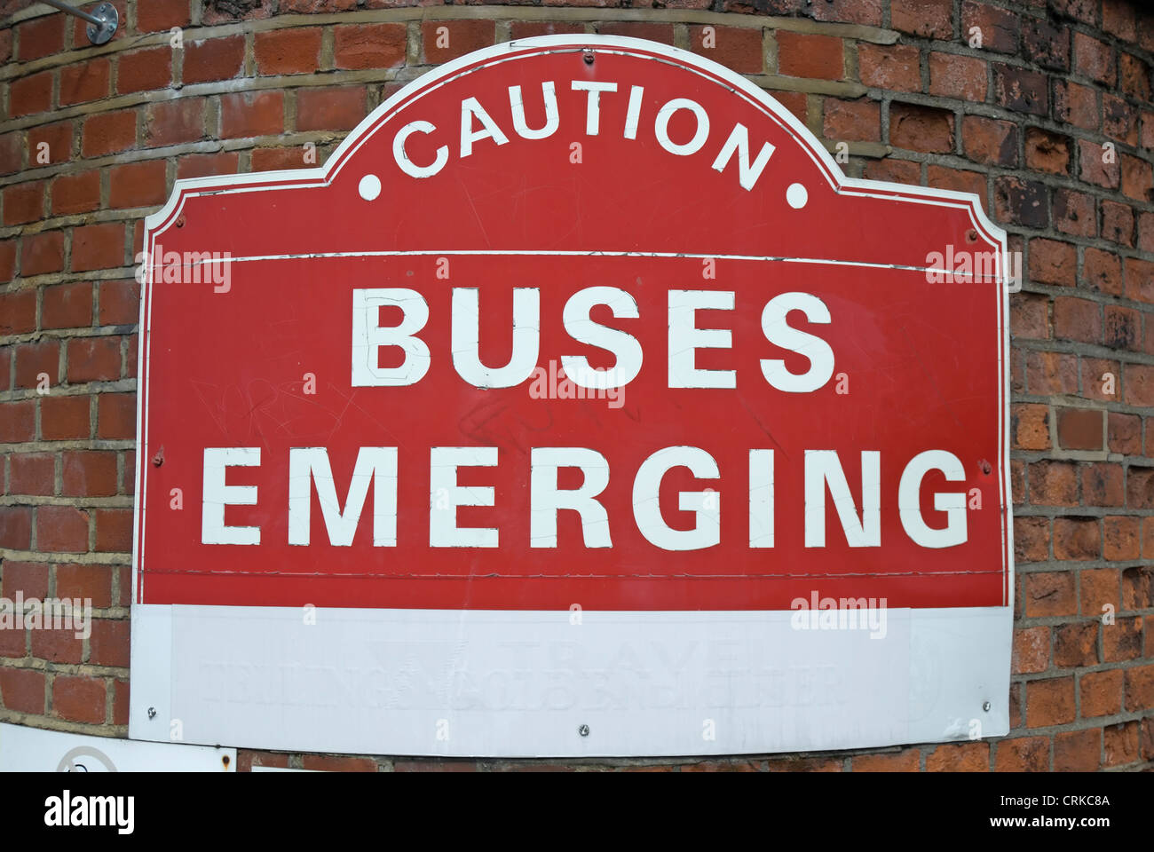 caution buses emerging sign outside fulwell bus depot, middlesex ...