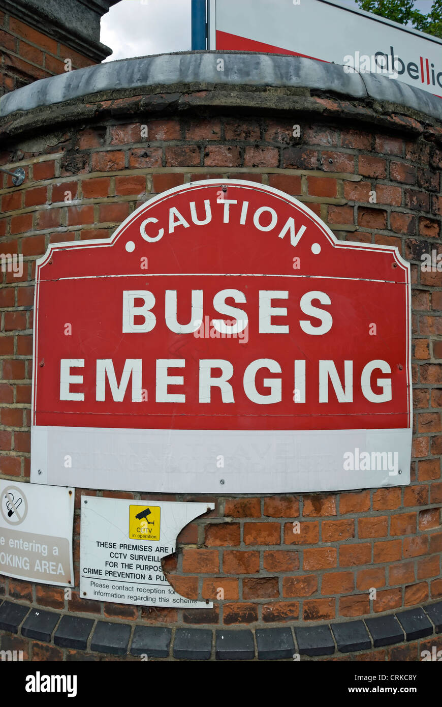 caution buses emerging sign outside fulwell bus depot, middlesex ...