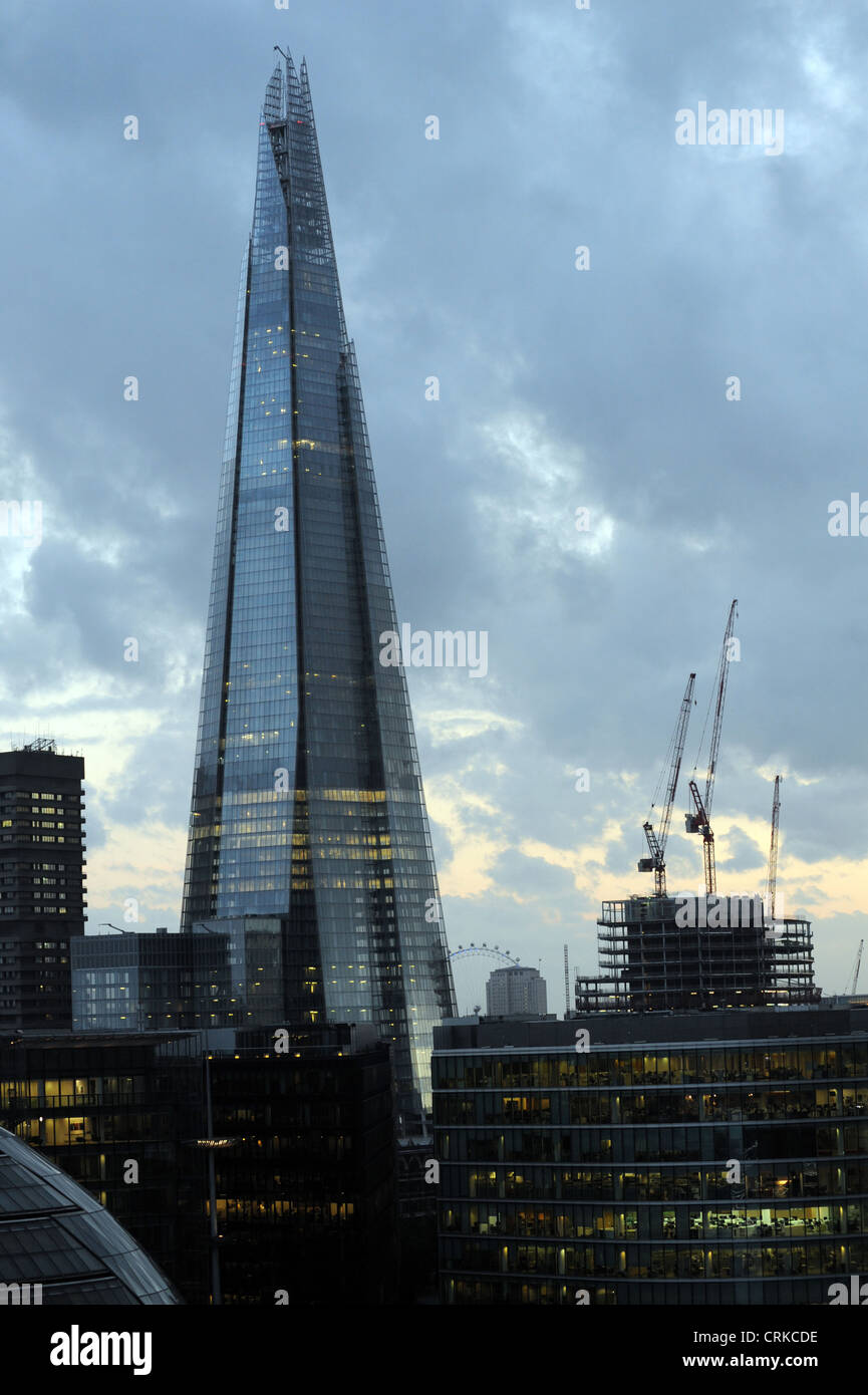 View towards the Shard from Tower bridge walkways at sunset Stock Photo ...