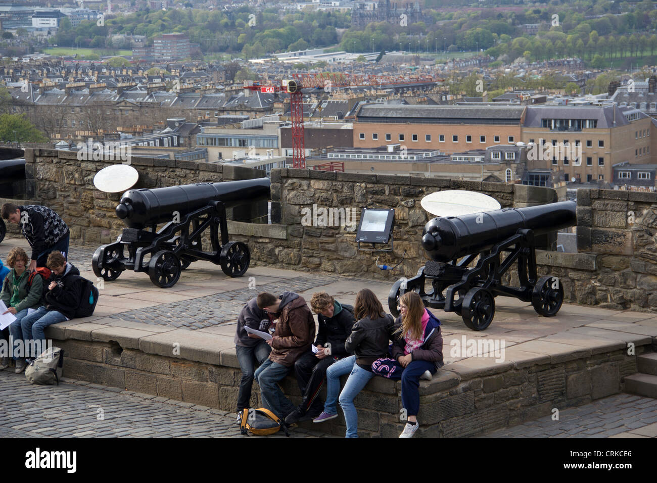 Tourists (probably students) inside the Edinburgh Castle at the foot of ...