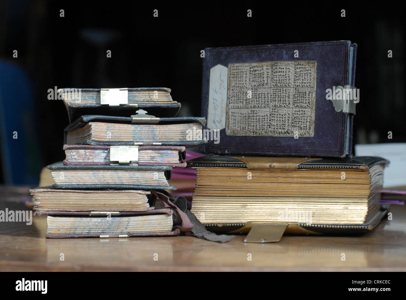 Antique books piled up Stock Photo - Alamy