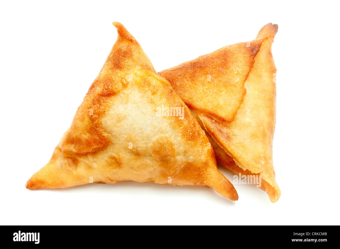 Homemade samosas on a white background Stock Photo - Alamy