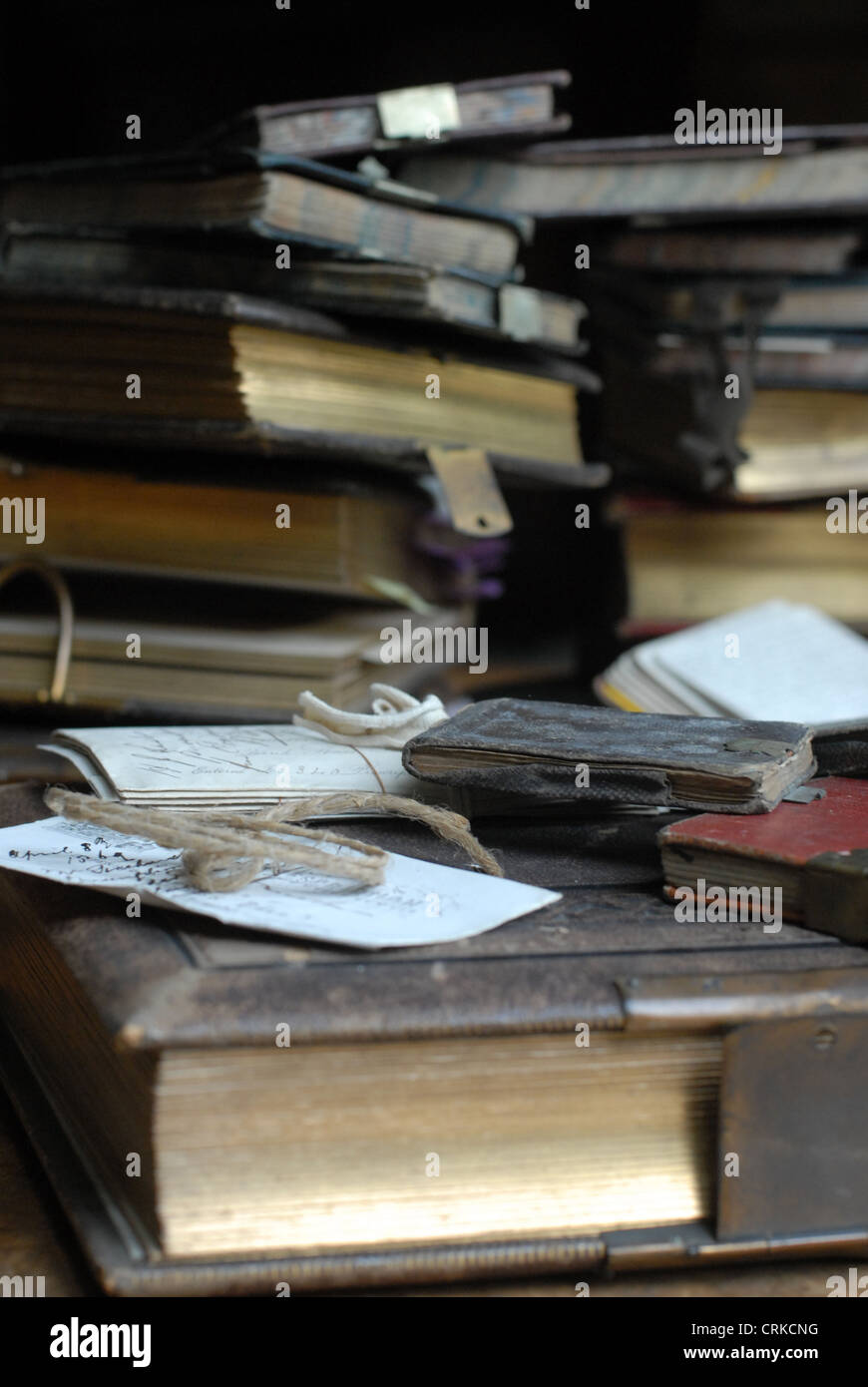 Antique books piled up Stock Photo - Alamy