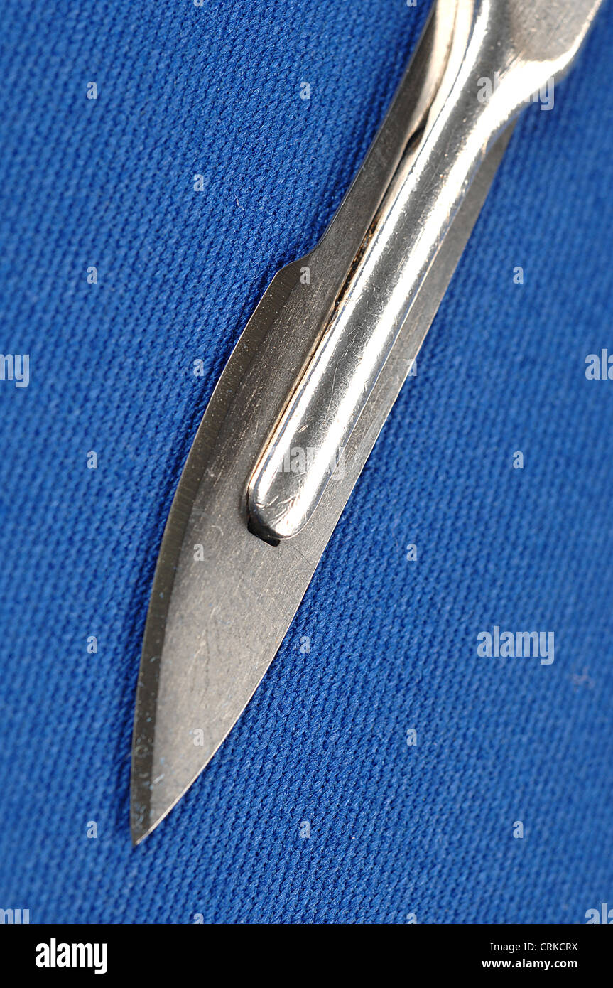 A number 23 blade scalpel on a number 4 handle, used to make the ...