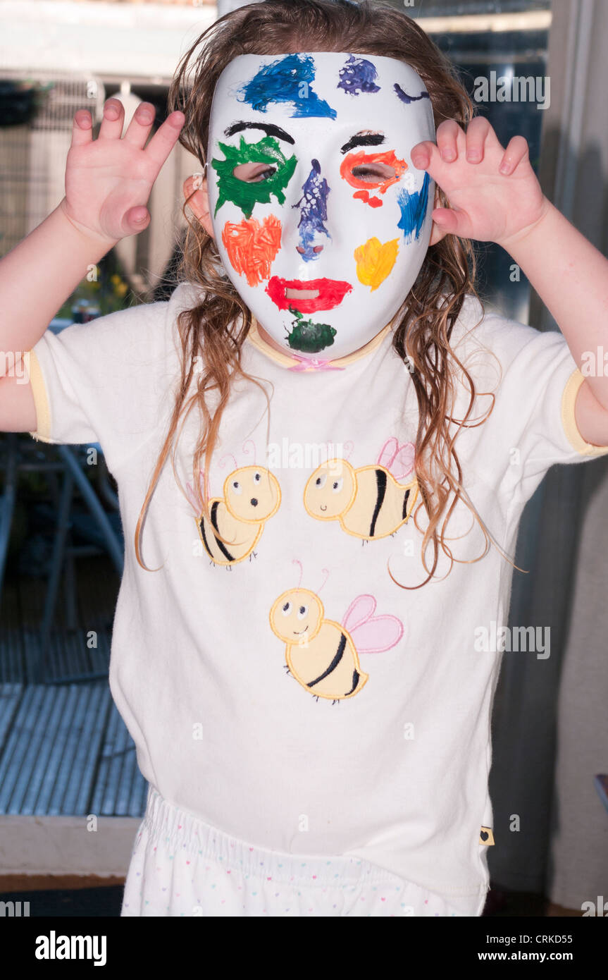 Young Child Wearing A Mask Stock Photo - Alamy