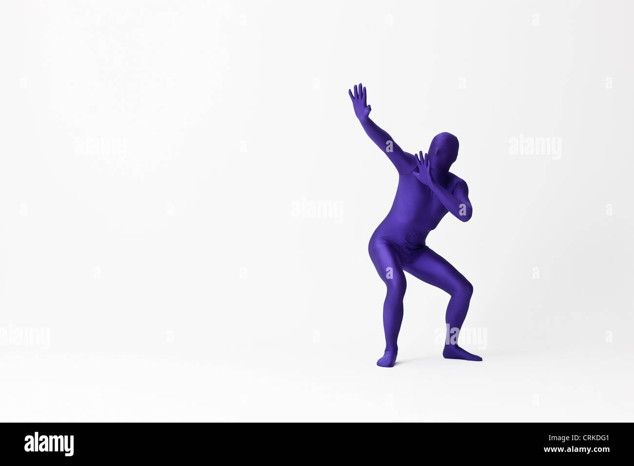 Man in bodysuit posing Stock Photo - Alamy