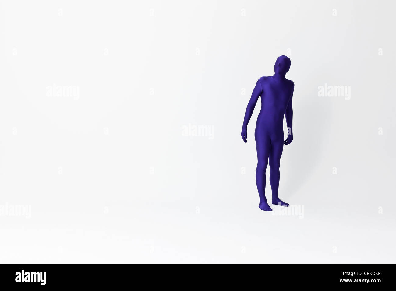 Man in bodysuit looking up Stock Photo - Alamy