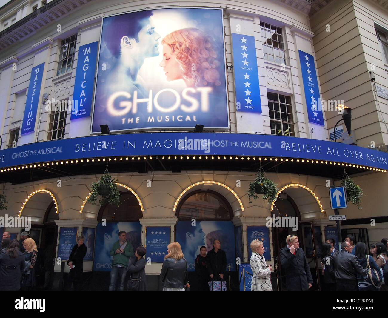 Theatregoers awaiting entrance to the Piccadilly Theatre to see "Ghost ...