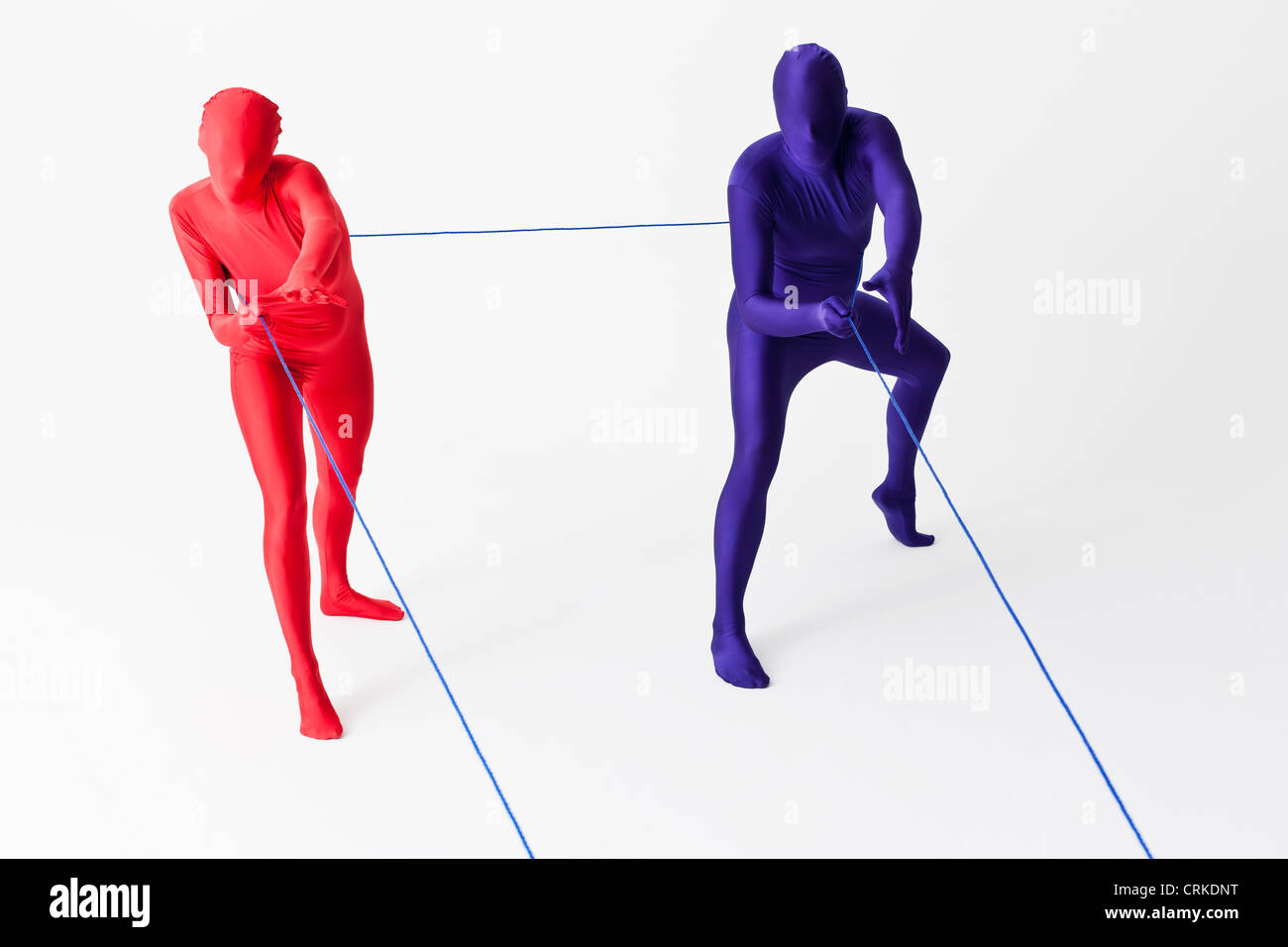 Couple in bodysuits playing with string Stock Photo - Alamy