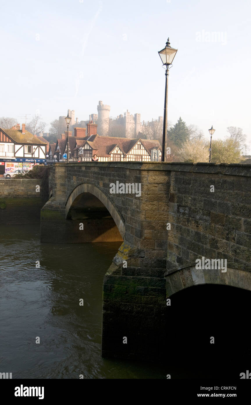 The centuries old arch bridge over the River Arun at Arundel,West ...