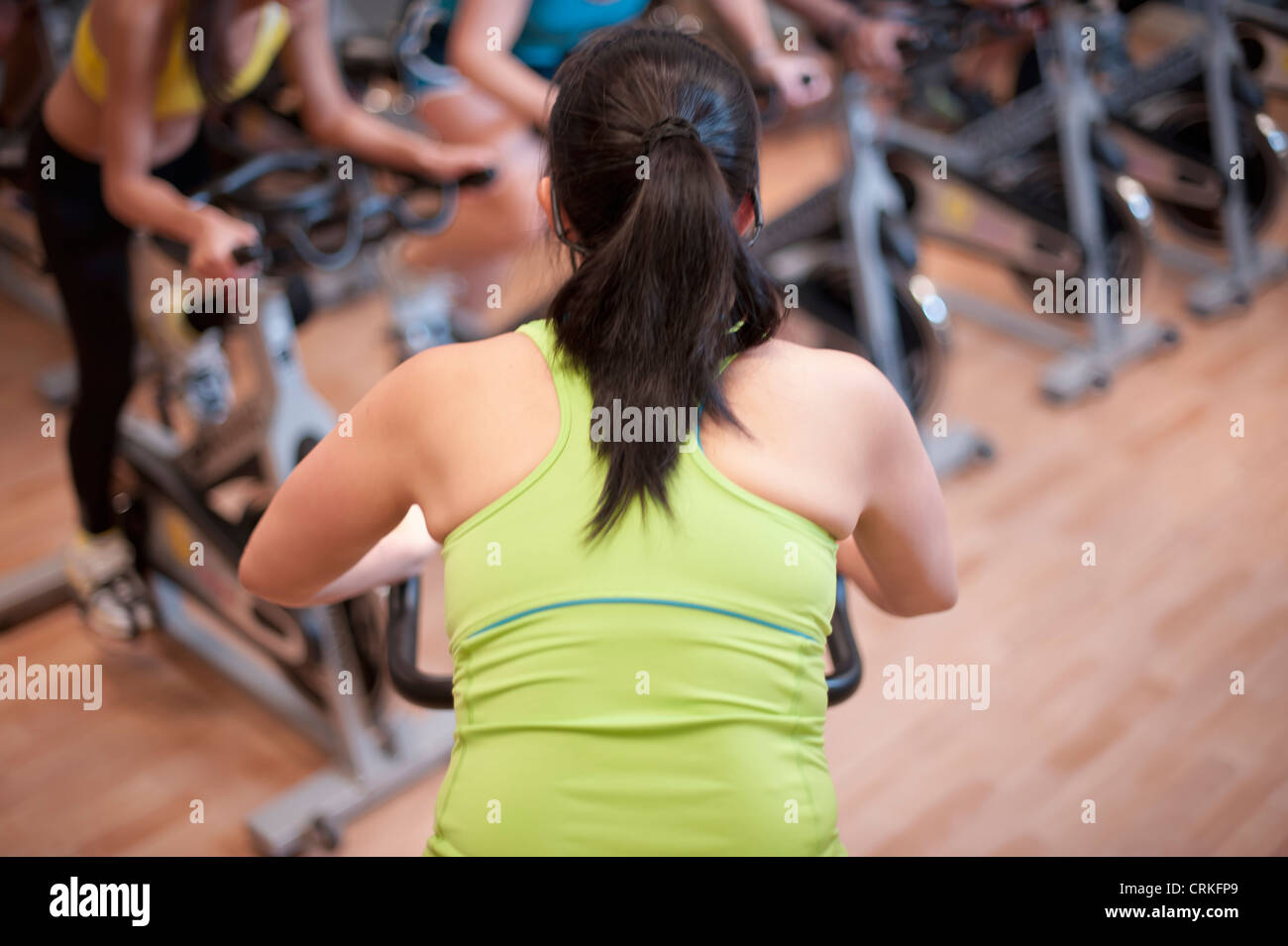 Woman sitting row machine hi-res stock photography and images - Alamy