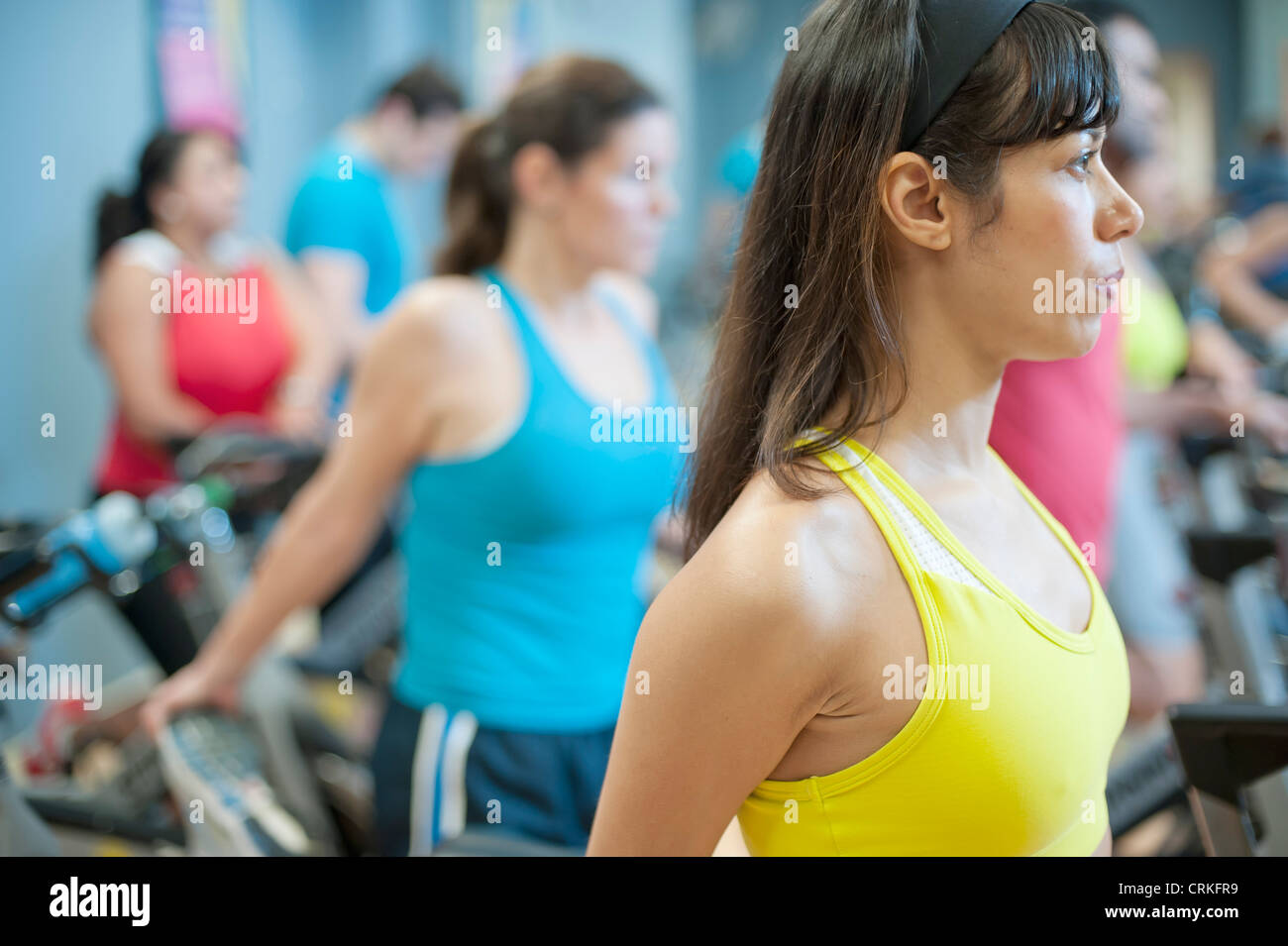 People stretching on spin machines Stock Photo - Alamy