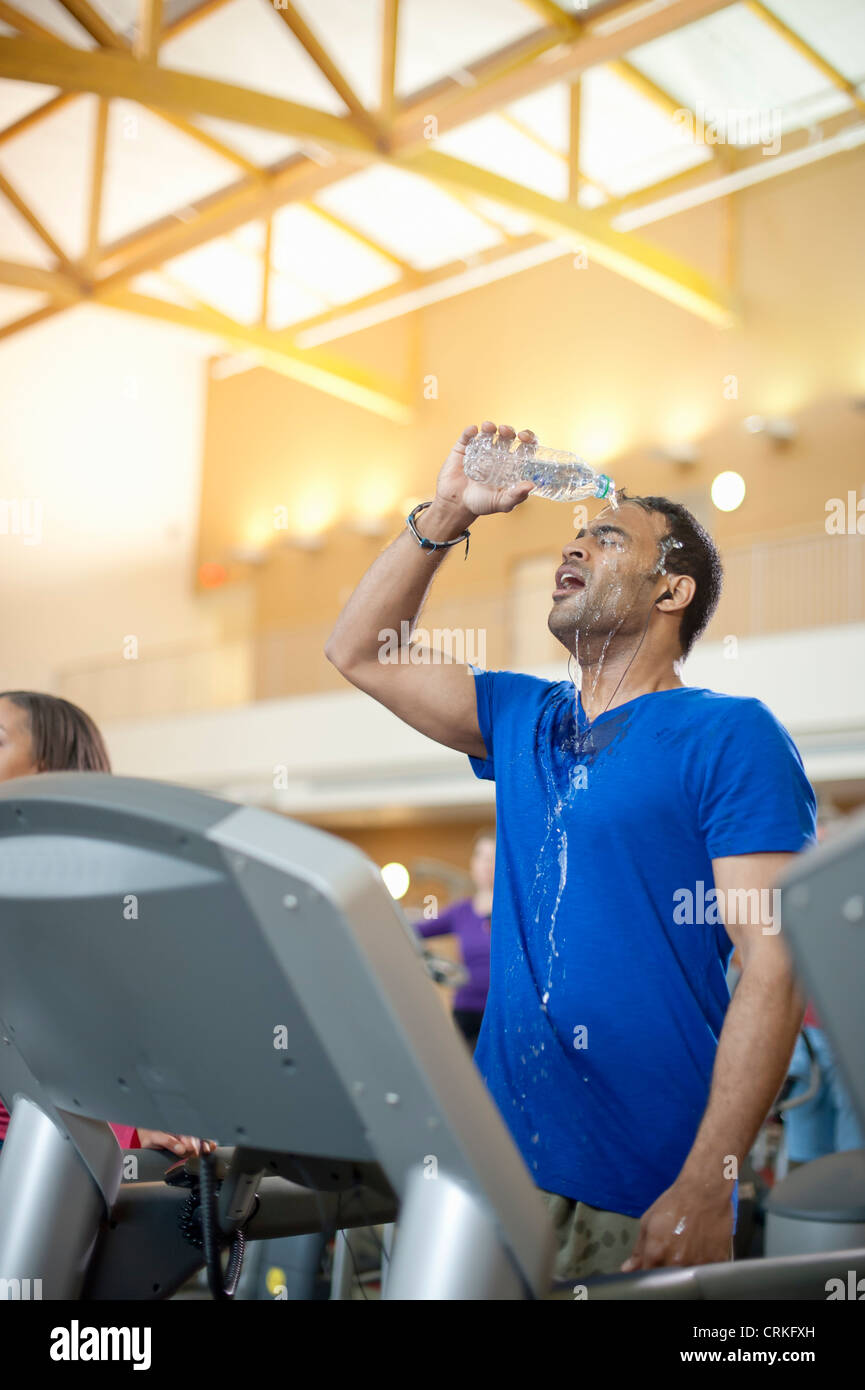 Man pouring water on himself hi-res stock photography and images - Alamy