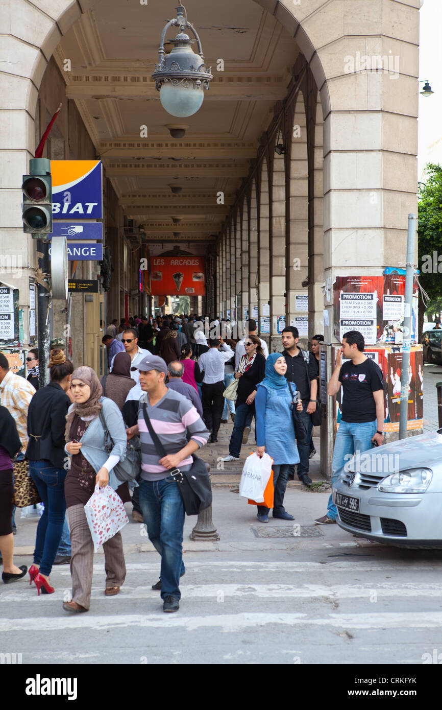 People Tunisians in rush hour on the streets of Tunis capital in ...