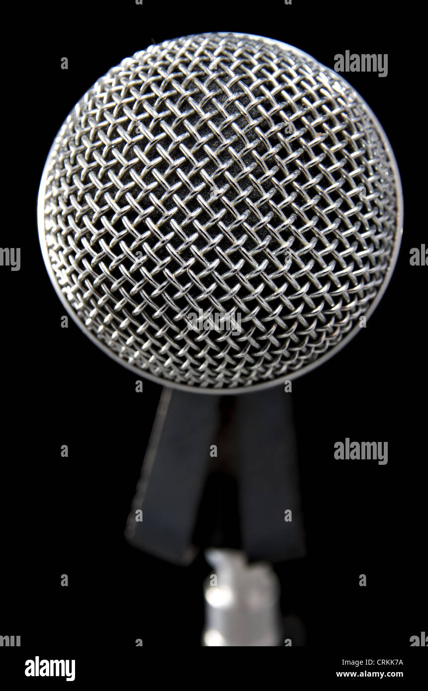 Silver shiny microphone on black Stock Photo - Alamy