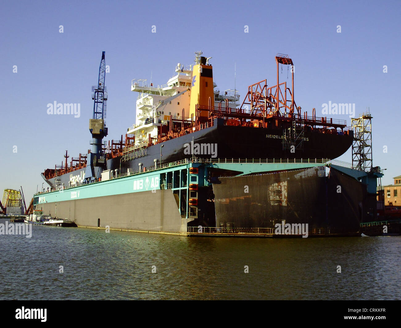 The container ship '''Heidelberg Express''' in a floating drydock of ...