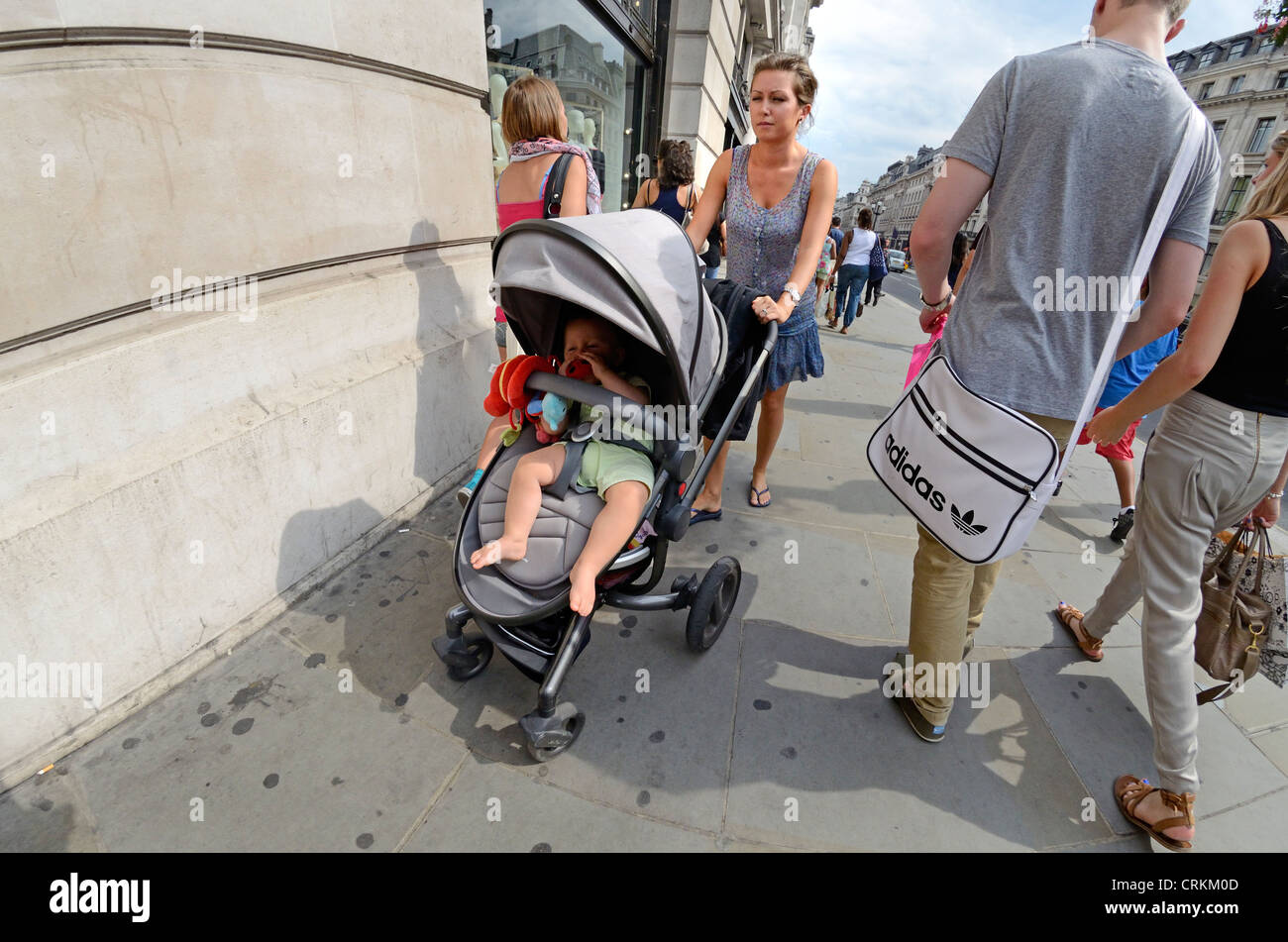 Baby in pushchair hi-res stock photography and images - Alamy