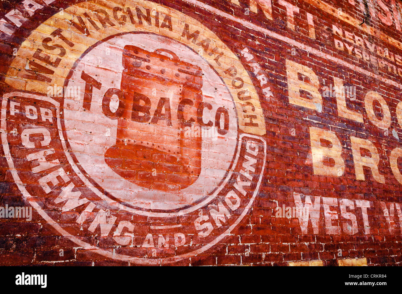 Historic advertisement on red brick building, Jacksonville, Oregon USA ...