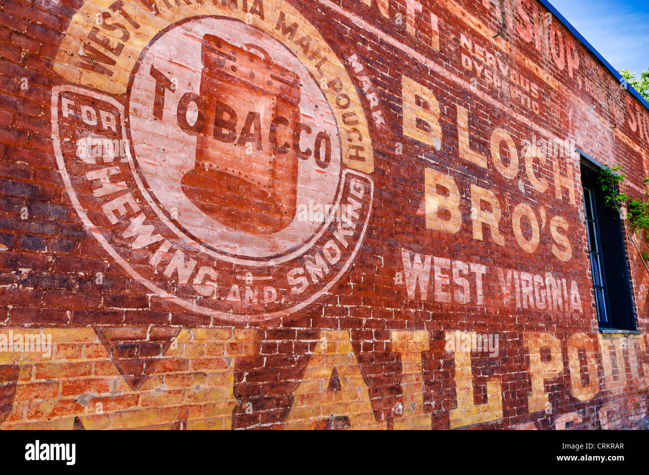 Historic advertisement on red brick building, Jacksonville, Oregon USA ...