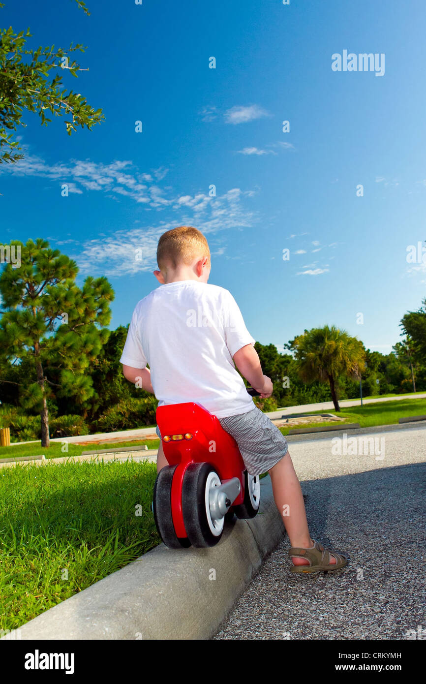 Boys push bike hi-res stock photography and images - Alamy