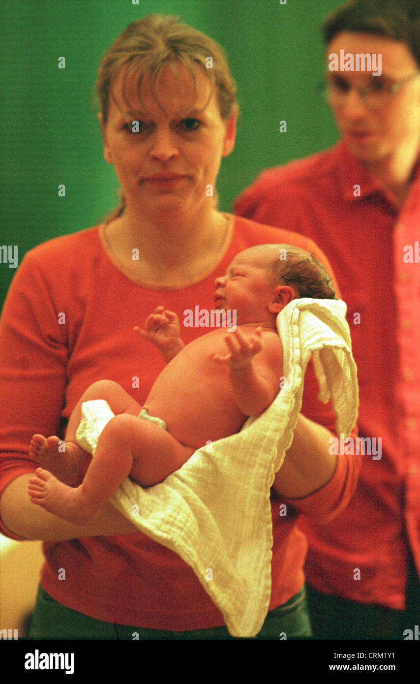 Midwife with newborn Stock Photo - Alamy