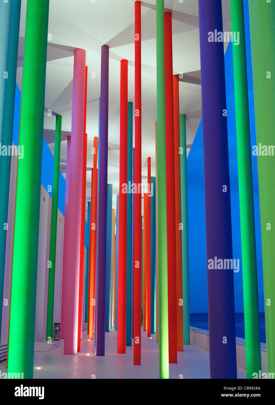 Illuminated neon-colored columns at night Stock Photo - Alamy