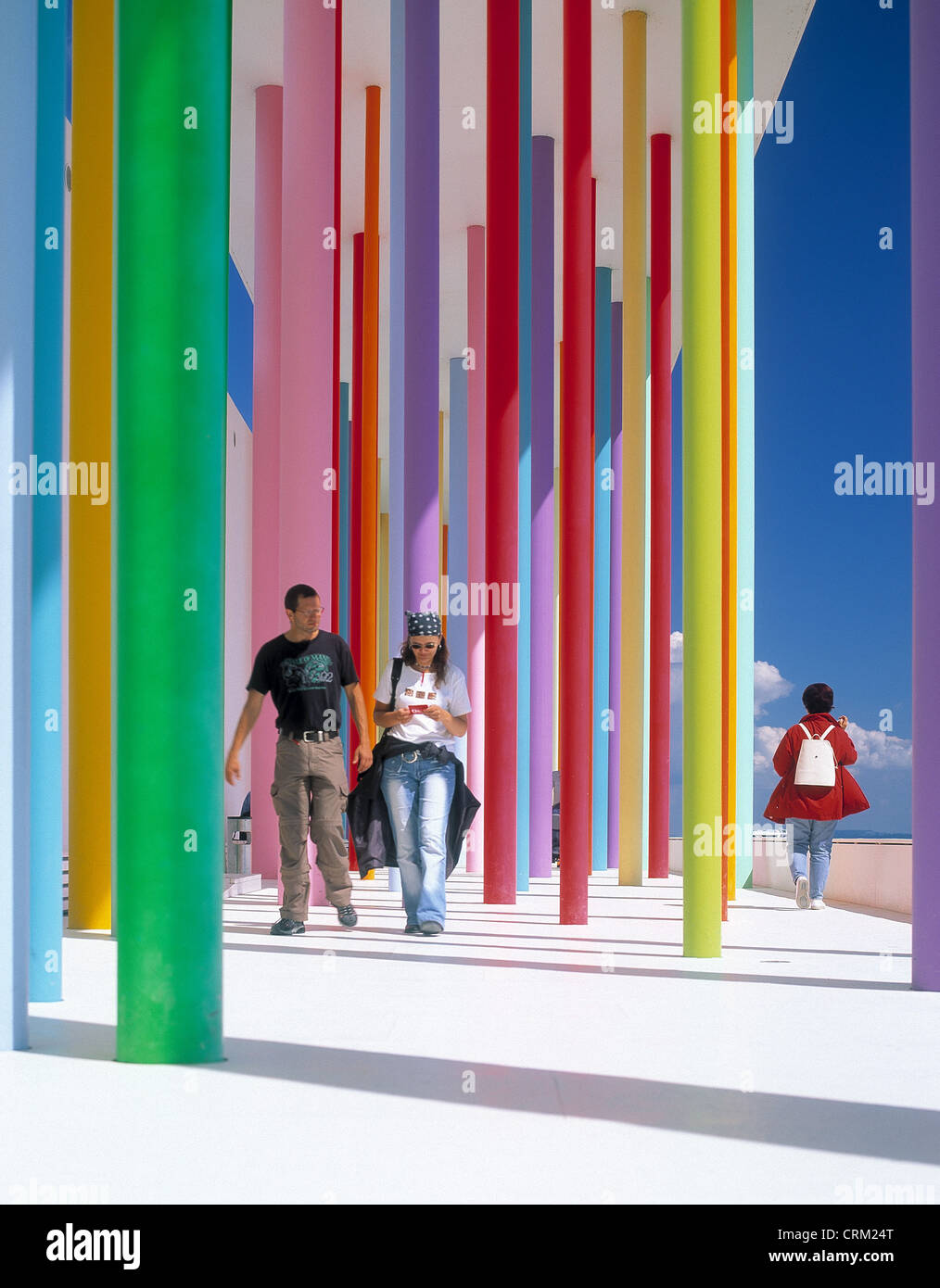 Expo 2002 visitors between neon-colored columns Stock Photo - Alamy