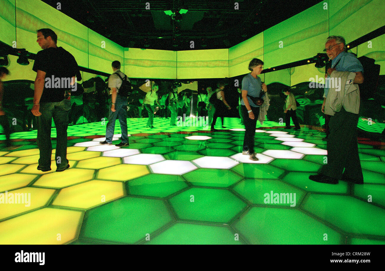 Visitors a multimedia installation at the Expo 2002 Stock Photo - Alamy