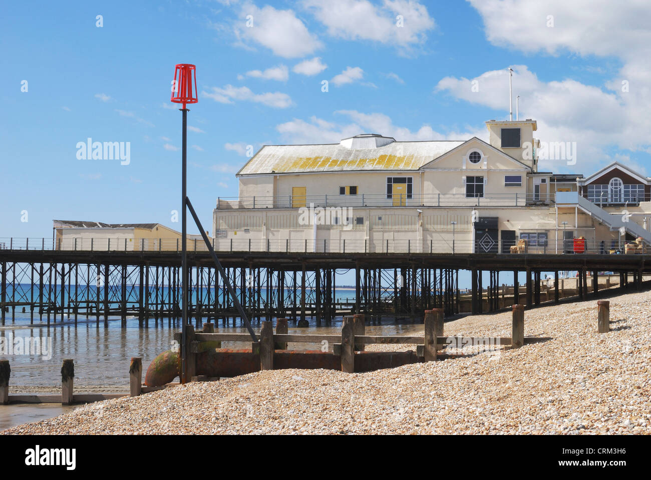 Pier and beach with fishing boats and nets at Bognor Regis in West ...