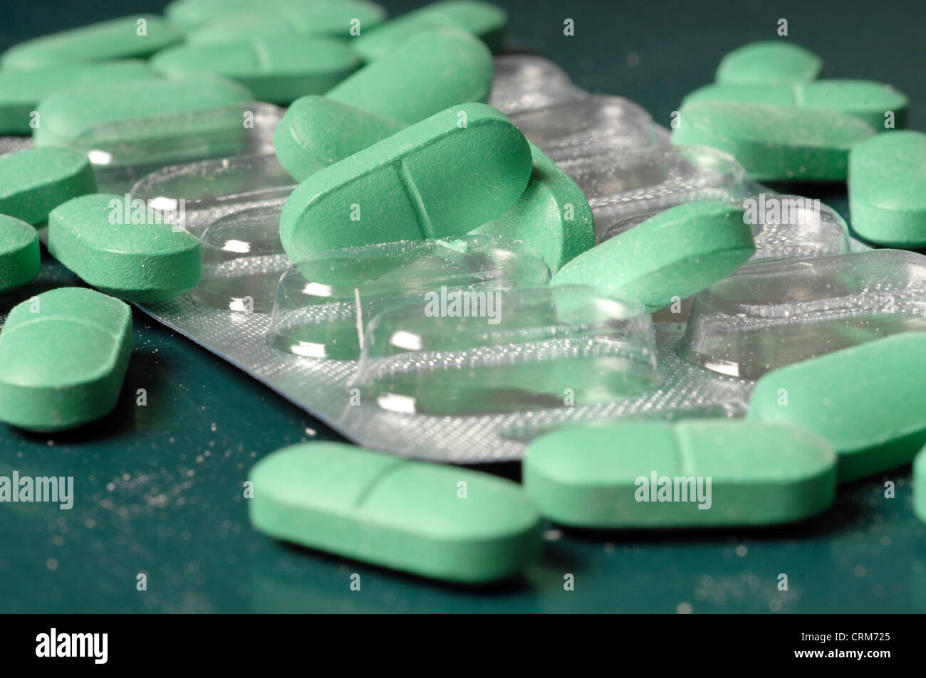 A selection of green tablets Stock Photo - Alamy