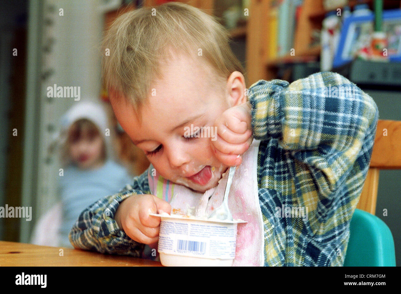Boy eat yogurt hi-res stock photography and images - Alamy