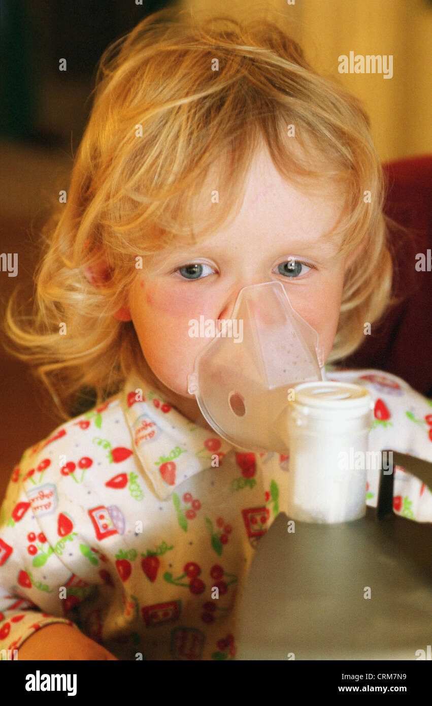One child inhaled using a device Stock Photo - Alamy