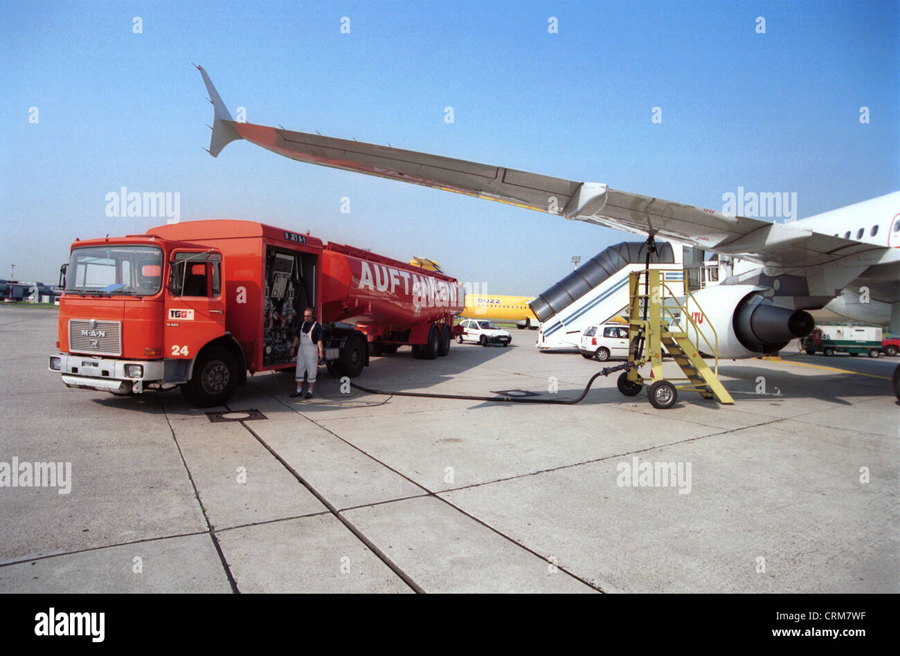 Airplane is refueled Stock Photo - Alamy