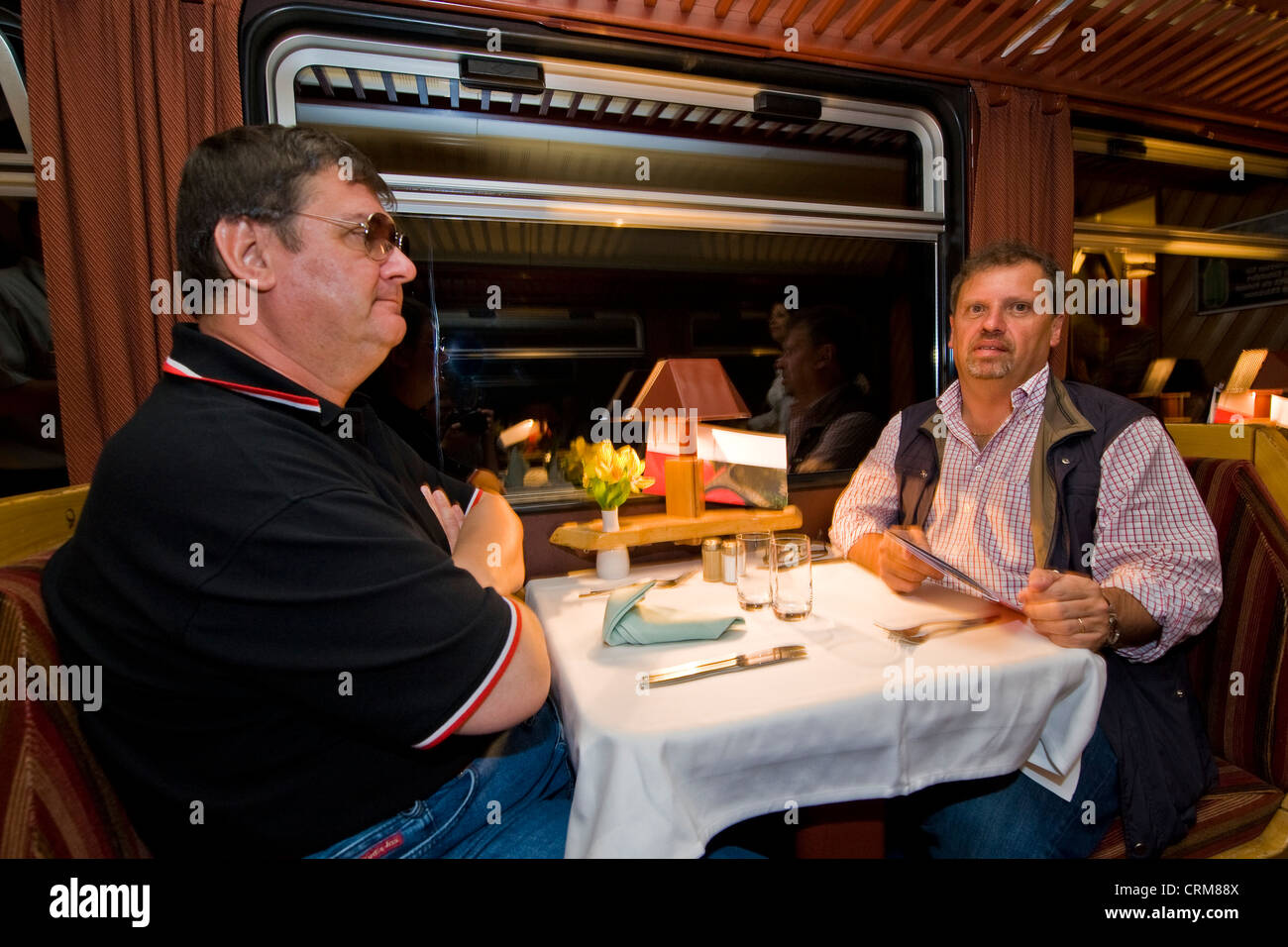 Switzerland, Canton Valais, Glacier express, lunch time in the dining ...