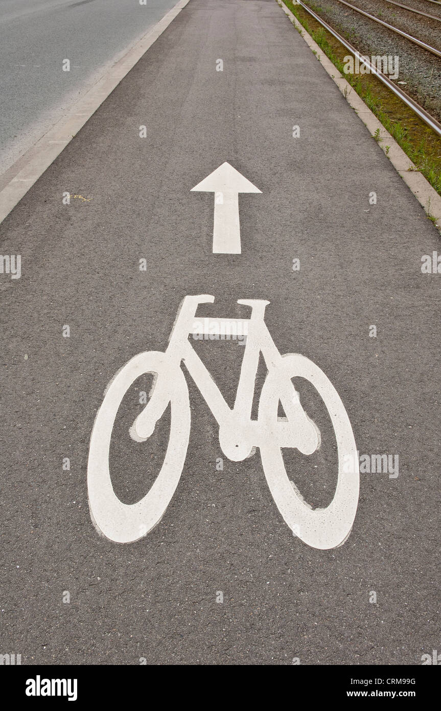 Bicycle sign on road Stock Photo - Alamy