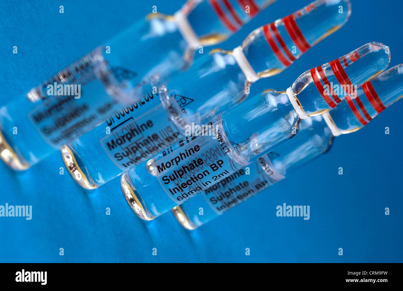 four veils of morphine on a blue backdrop Stock Photo - Alamy
