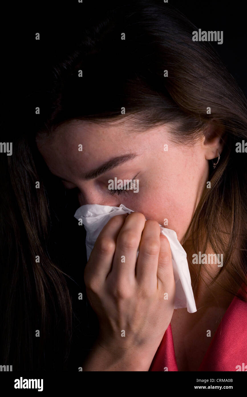 Woman sneezing cold hi-res stock photography and images - Alamy