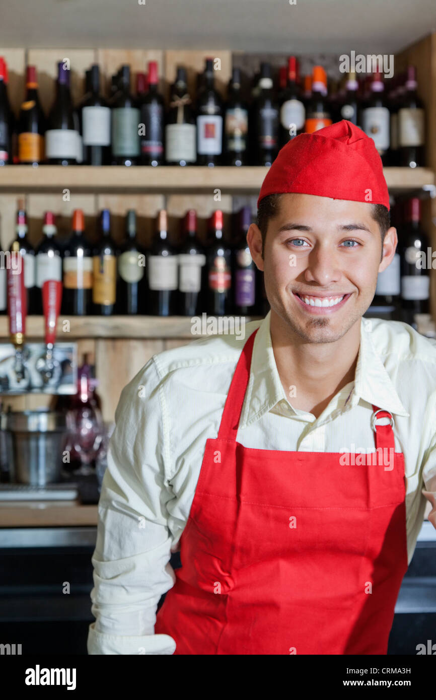 Portrait of a happy bartender Stock Photo - Alamy
