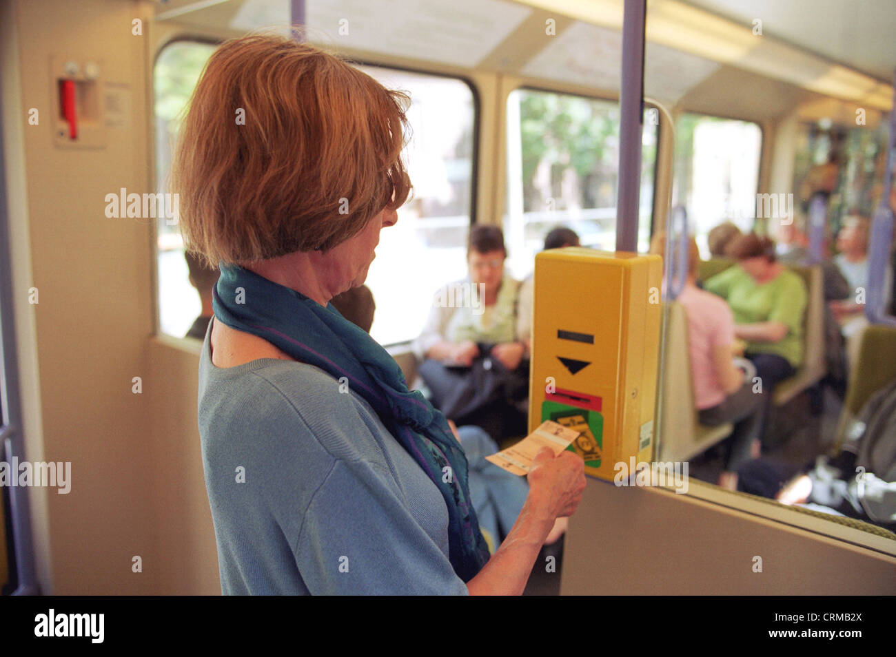 A woman tied a ticket Stock Photo - Alamy