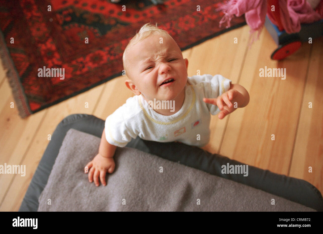 Baby fusses (12 months), Berlin Stock Photo - Alamy