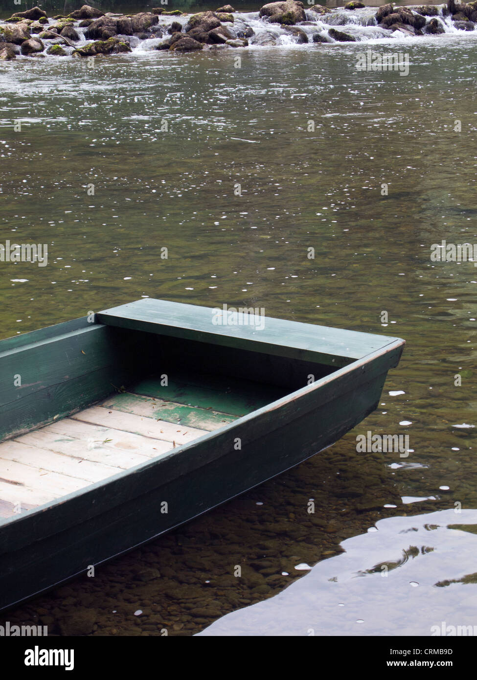 Empty wooden boat river bank hi-res stock photography and images - Alamy