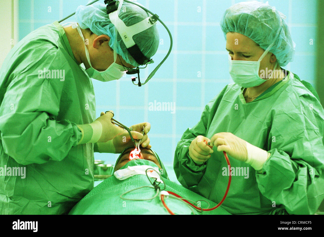 Surgery on the nose, Berlin Stock Photo - Alamy
