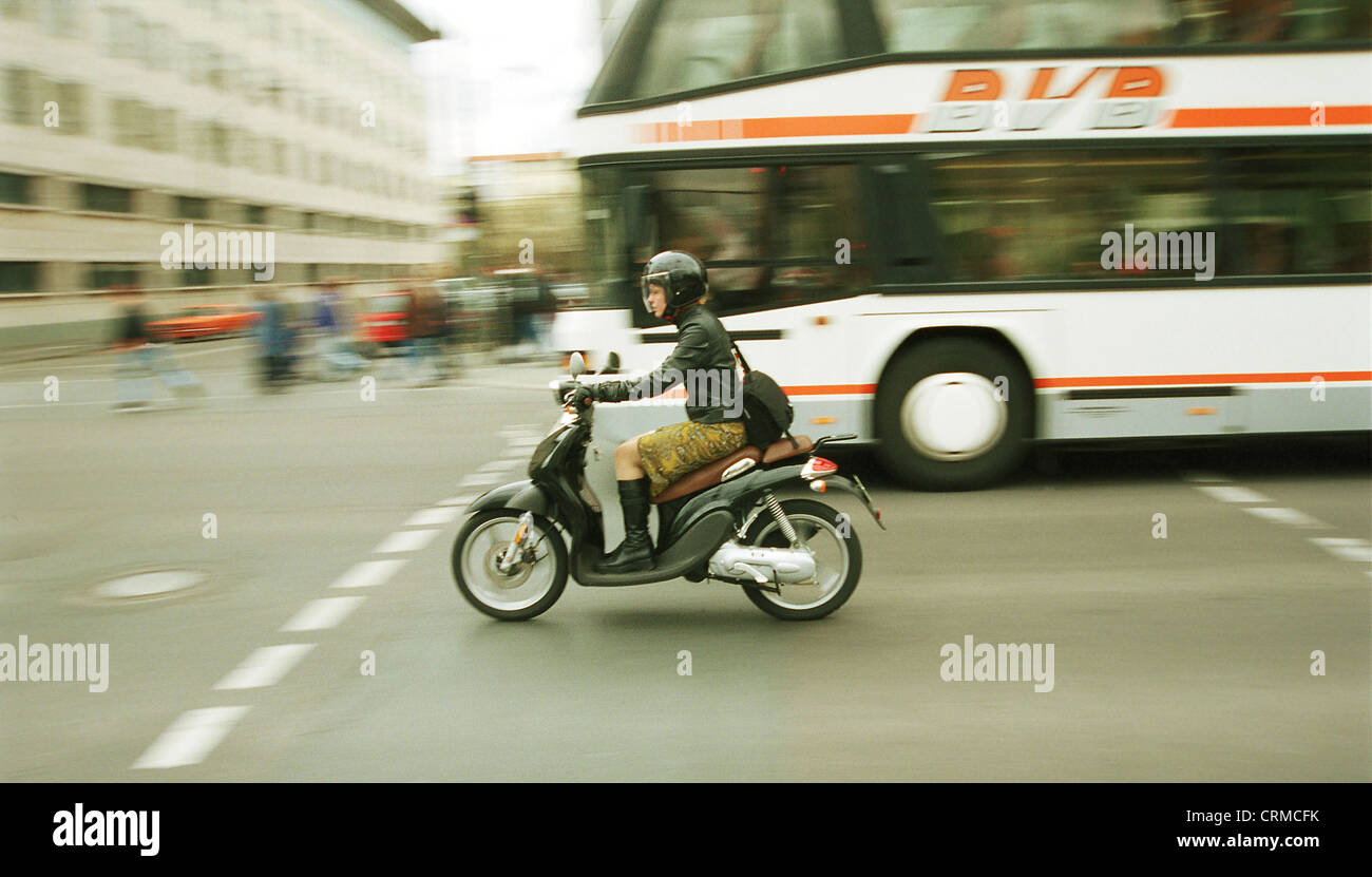 Moped rider in Berlin Stock Photo - Alamy